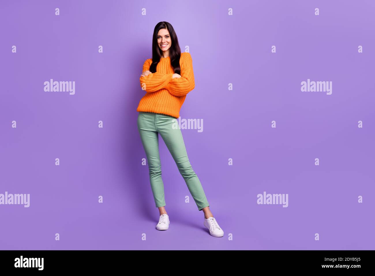Full length body size photo of young girl smiling with folded hands ...