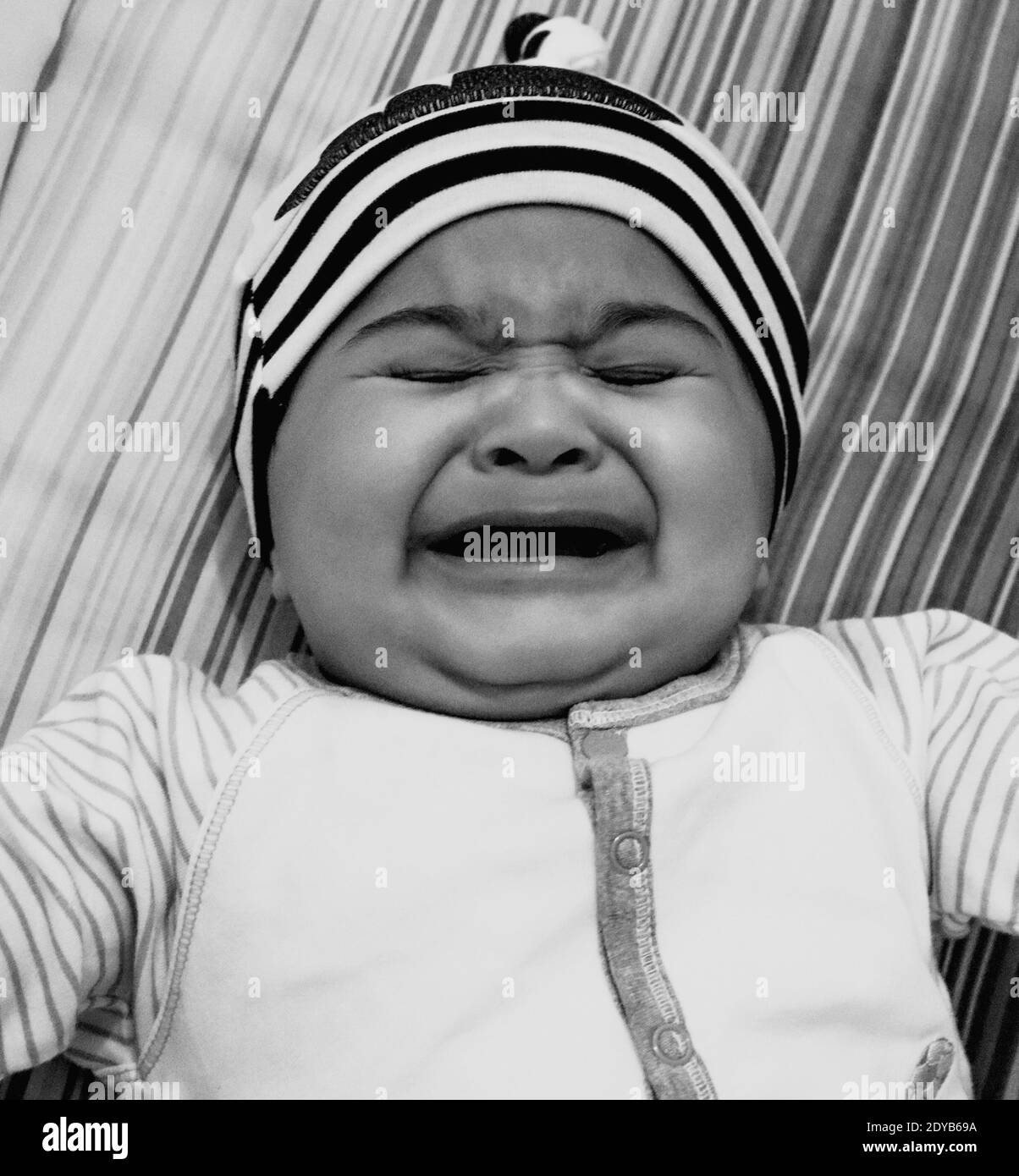 Baby boy crying face Black and White Stock Photos & Images - Alamy