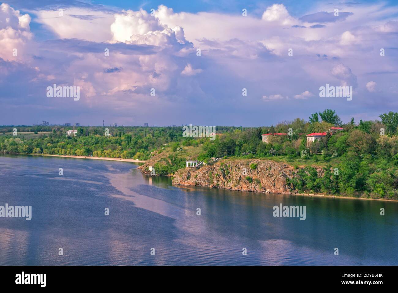 Beautiful spring landscape with river, lush forest, cliffs and white ...