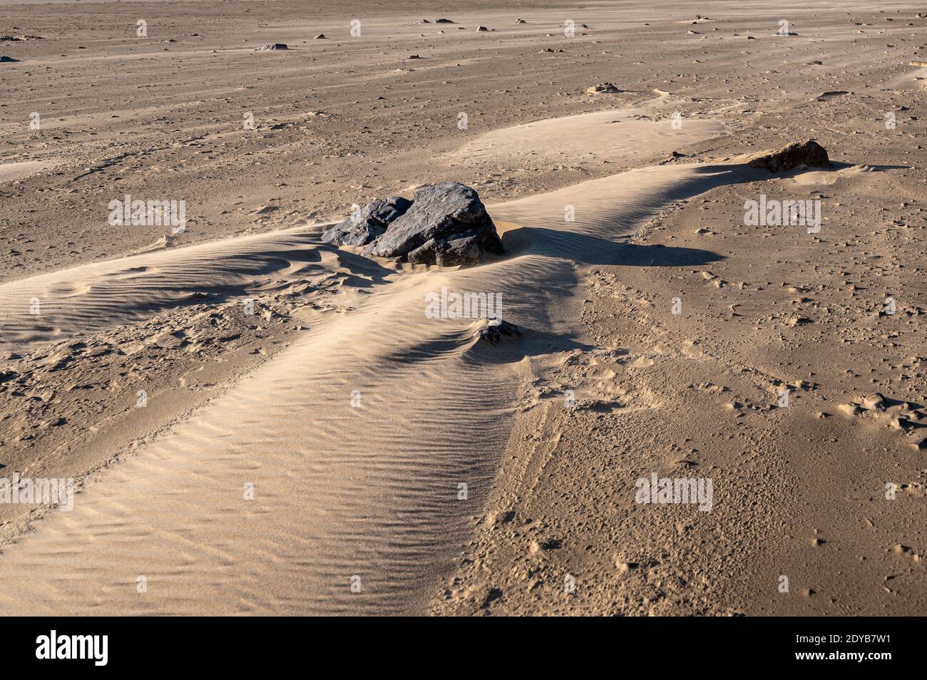 Unusual Shapes On Sand Beach Stock Photo - Alamy