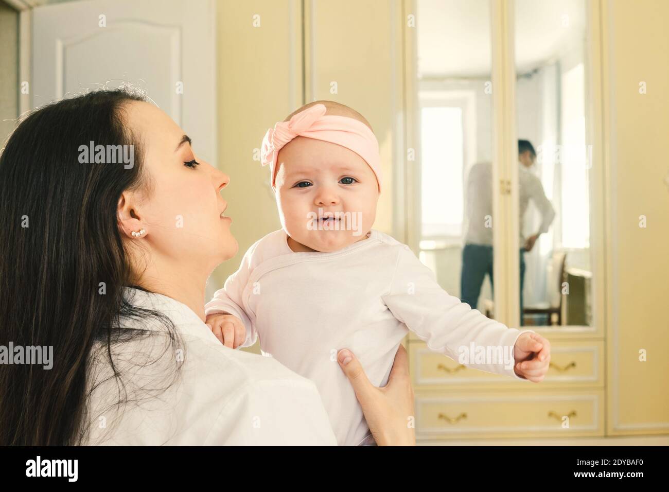 Father holding baby mirror hi-res stock photography and images - Alamy