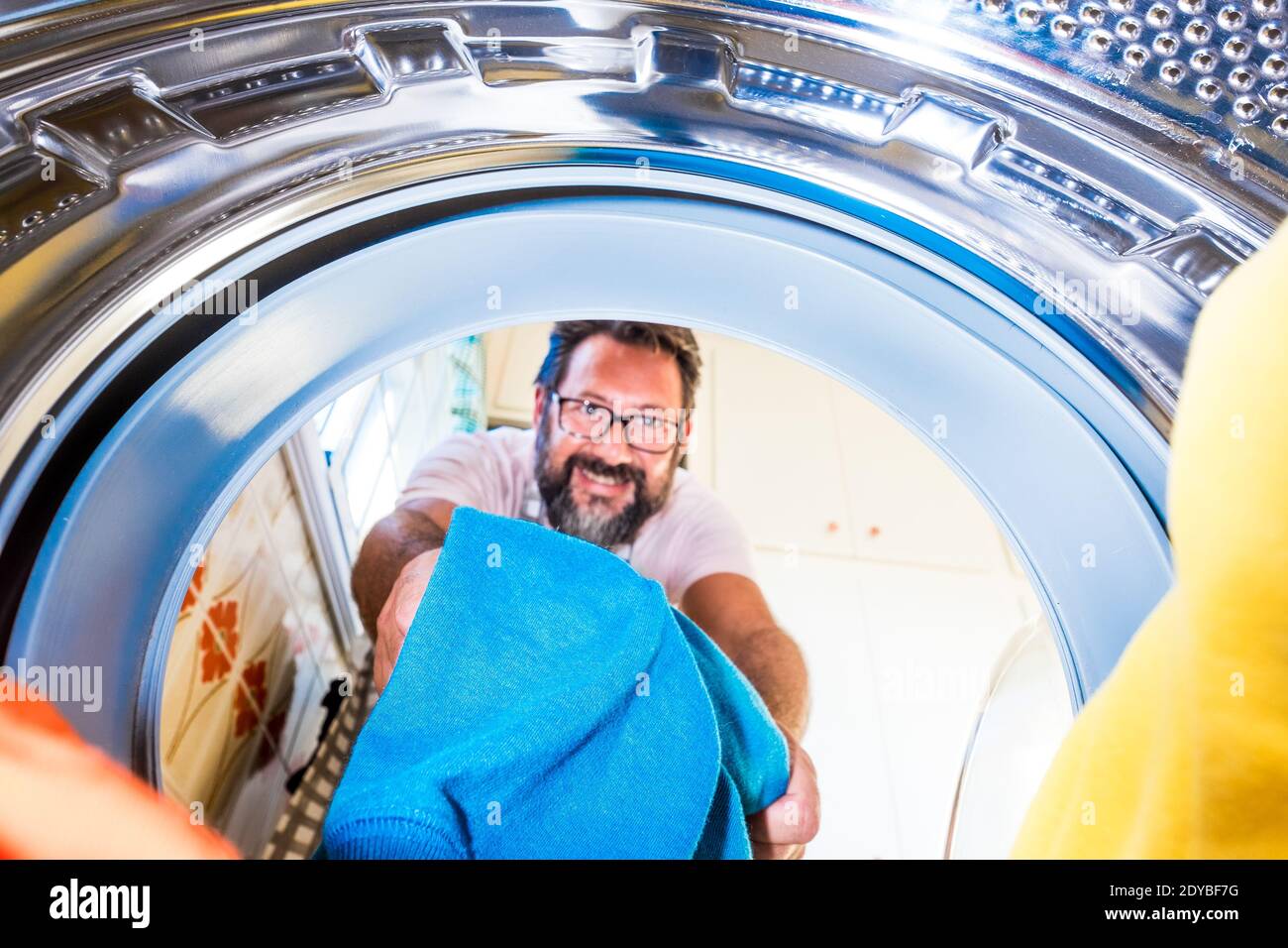 Man inside dryer laundromat clothing hi-res stock photography and ...