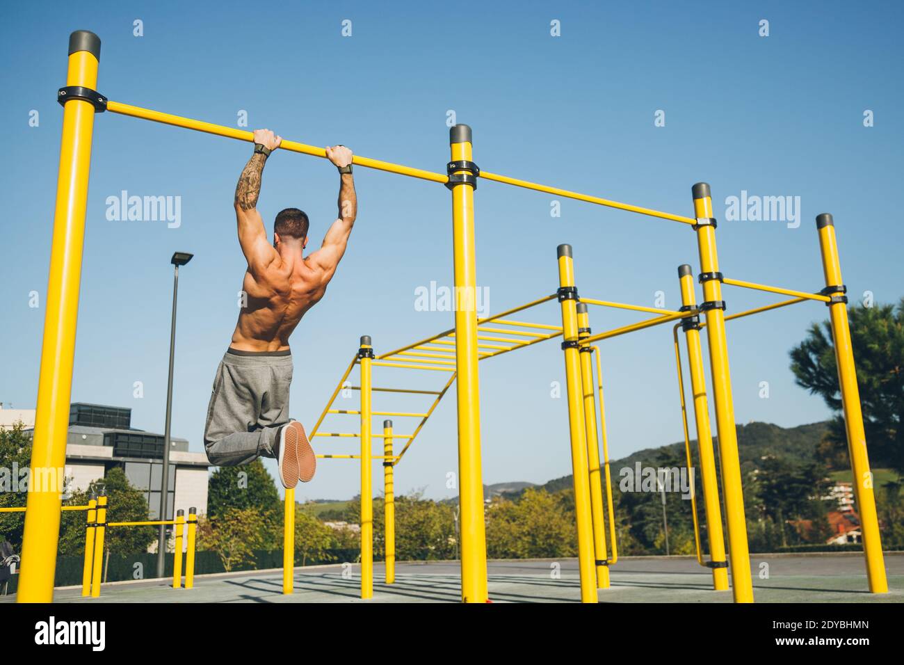 Person hanging bar public hi-res stock photography and images - Alamy
