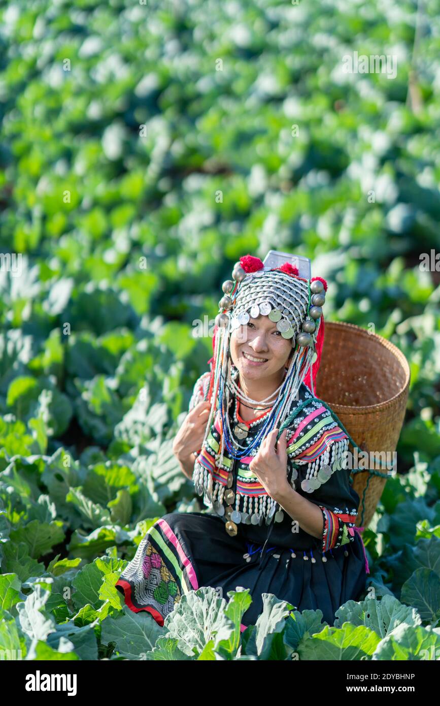 High Angle Portrait Of Woman In Traditional Clothing Amidst Farm Stock ...