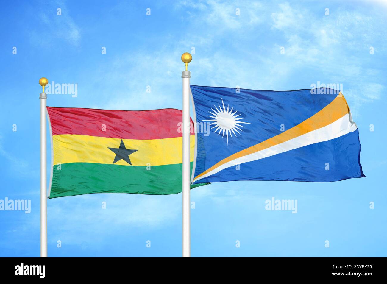 Ghana and Marshall Islands two flags on flagpoles and blue sky Stock ...