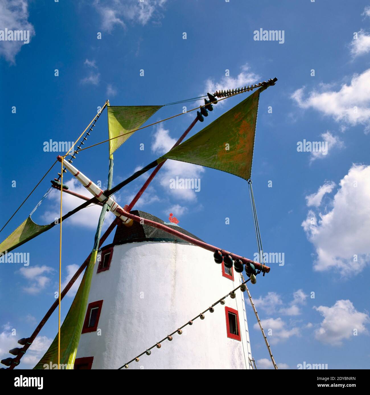 Traditional Portuguese windmill at the Algarve in Portugal Stock Photo ...