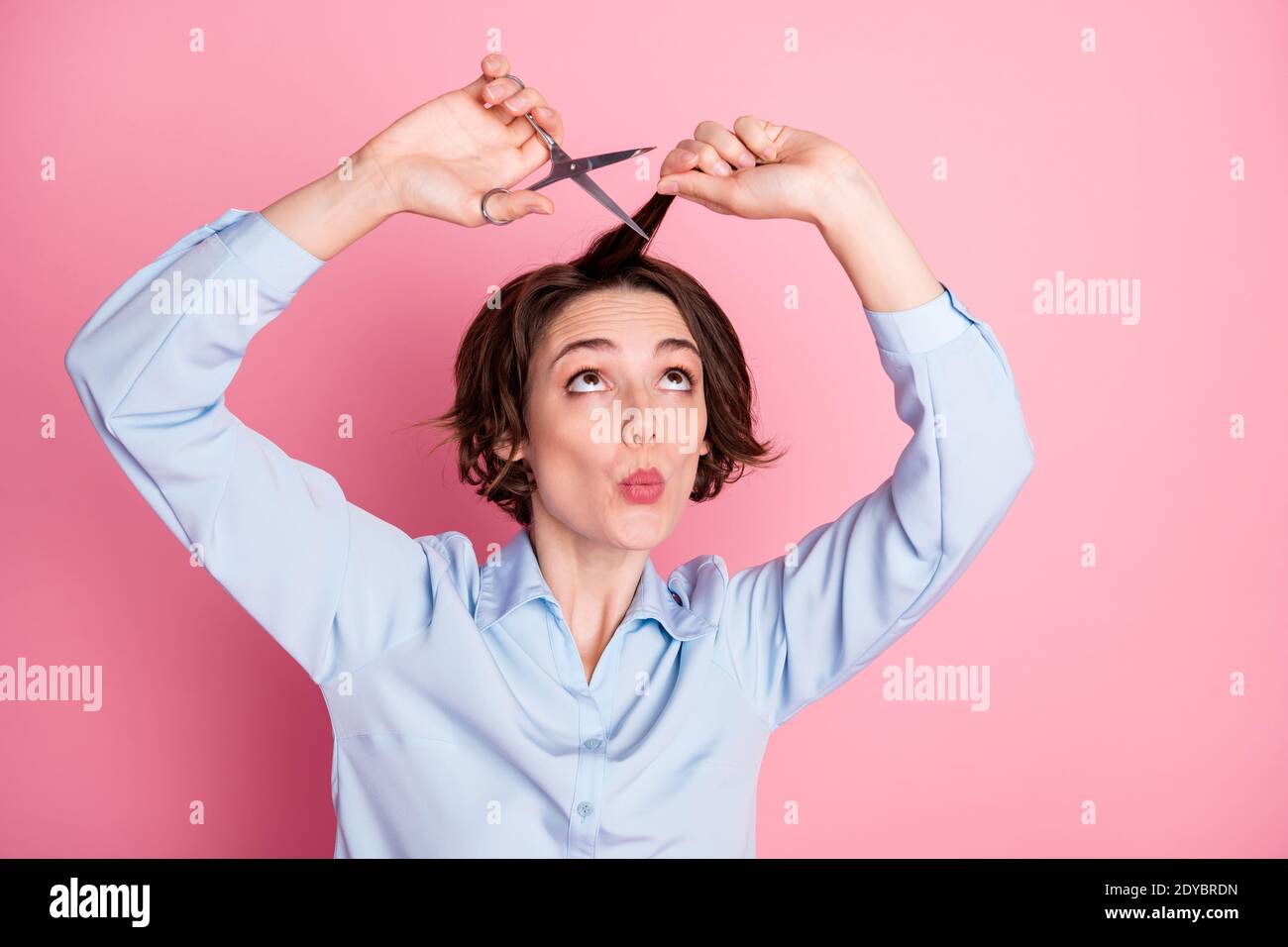Photo Of Attractive Funny Pretty Lady Hold Hairdo Curl Cutting Split