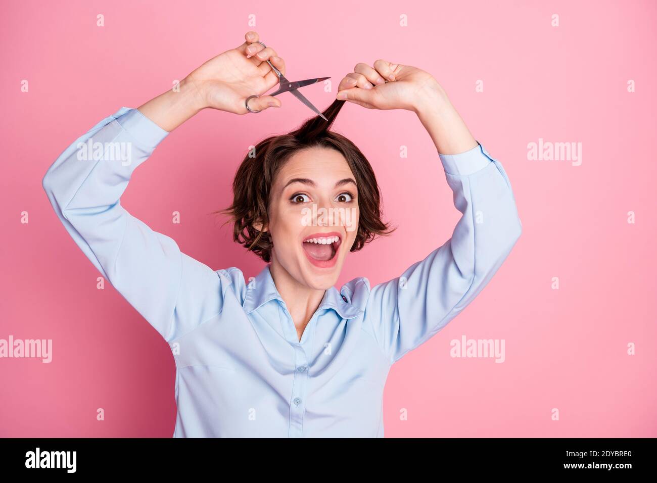 Photo Of Attractive Funny Overjoyed Lady Hold Hairdo Curl Cutting Split
