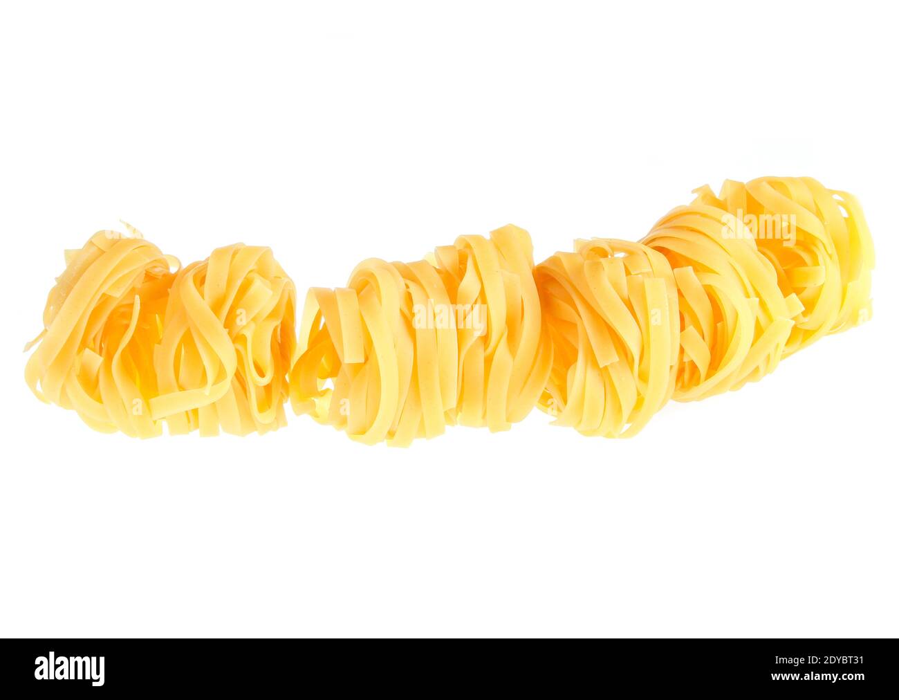 Many maw dry tagliatelle noodle isolated on white background Stock ...