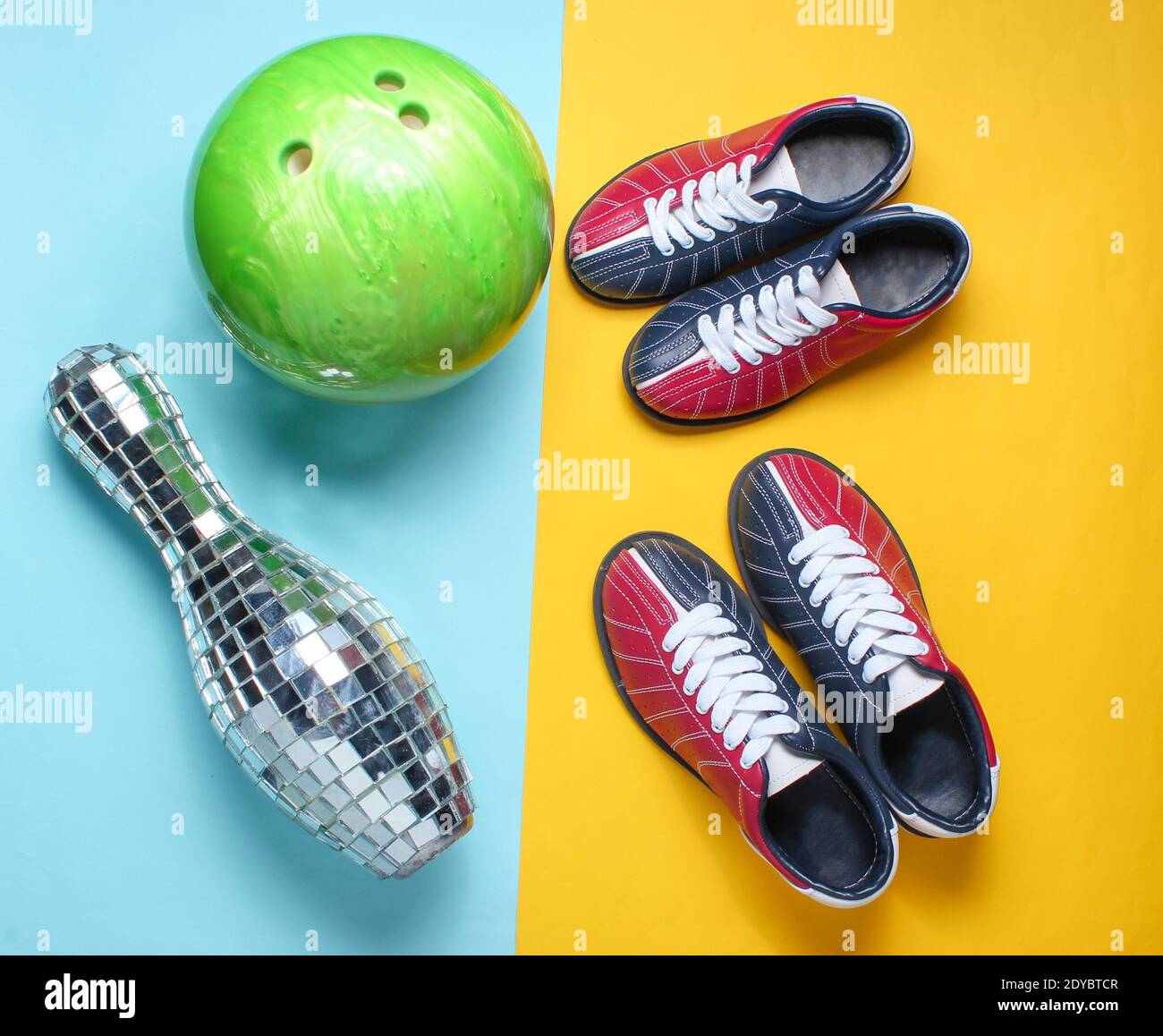 Bowling shoes, disco mirror skittle and bowling ball on blue yellow ...