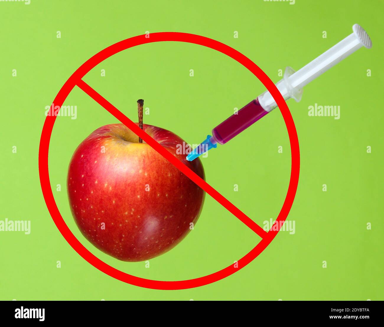 Genetically modified Red Apple with syringes on green background.Stop ...