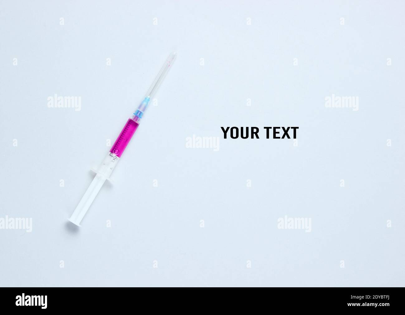 Medical concept, injection, vaccination. Syringe with purple liquid on ...