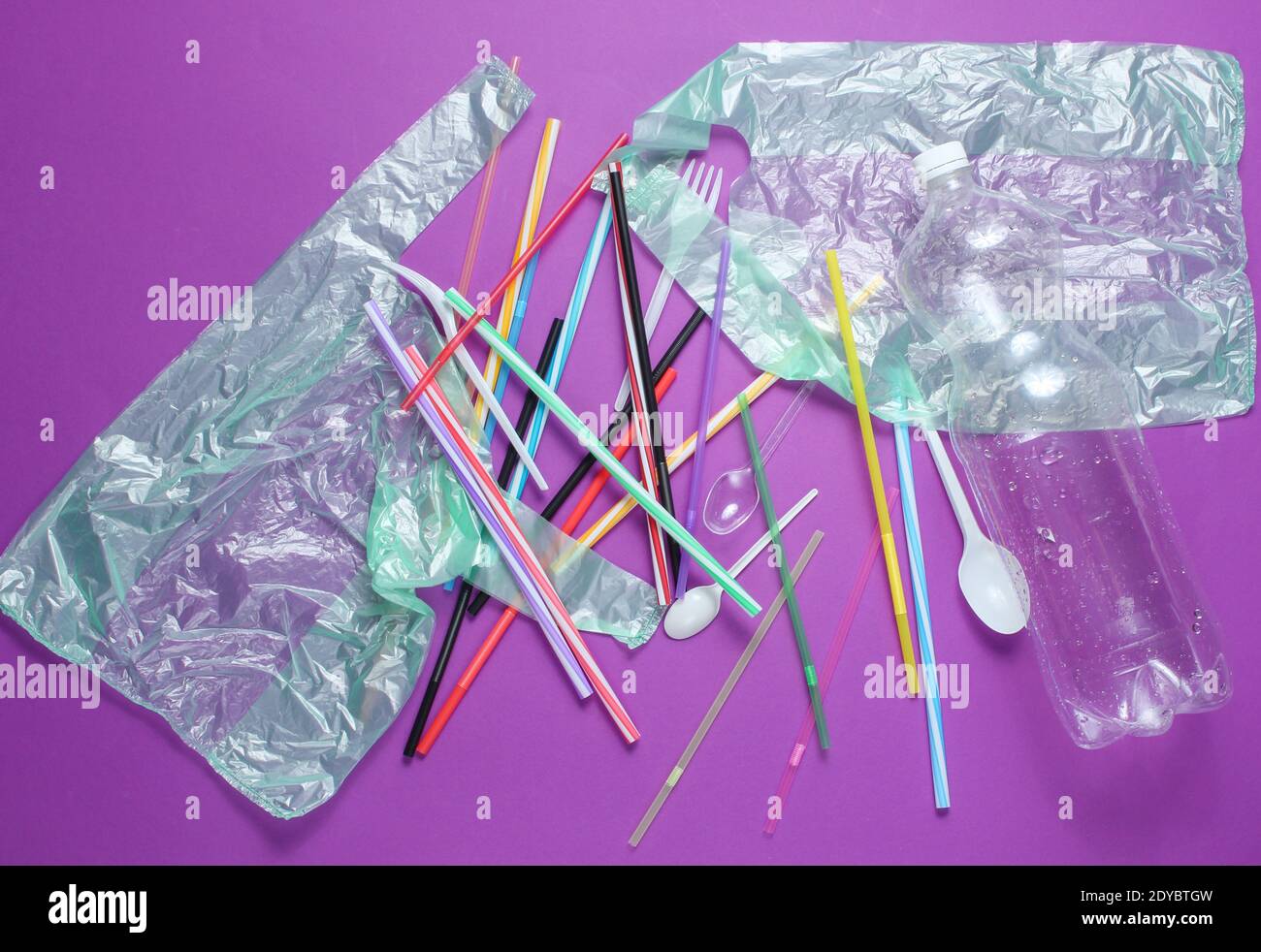 The concept of pollution environment. Cellophane bag, plastic bottle ...