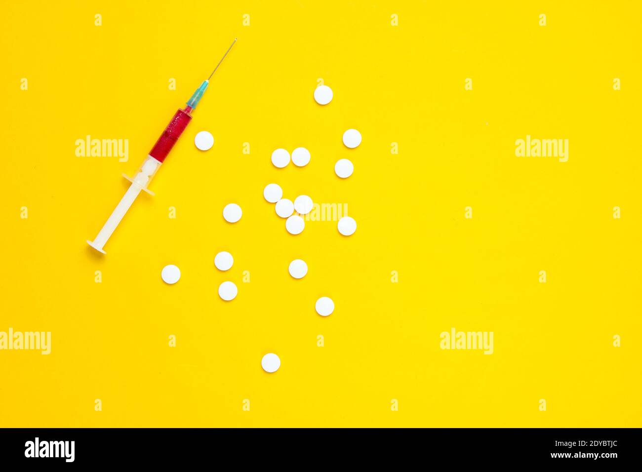 Medical concept, injection, vaccination. Syringe with purple liquid ...