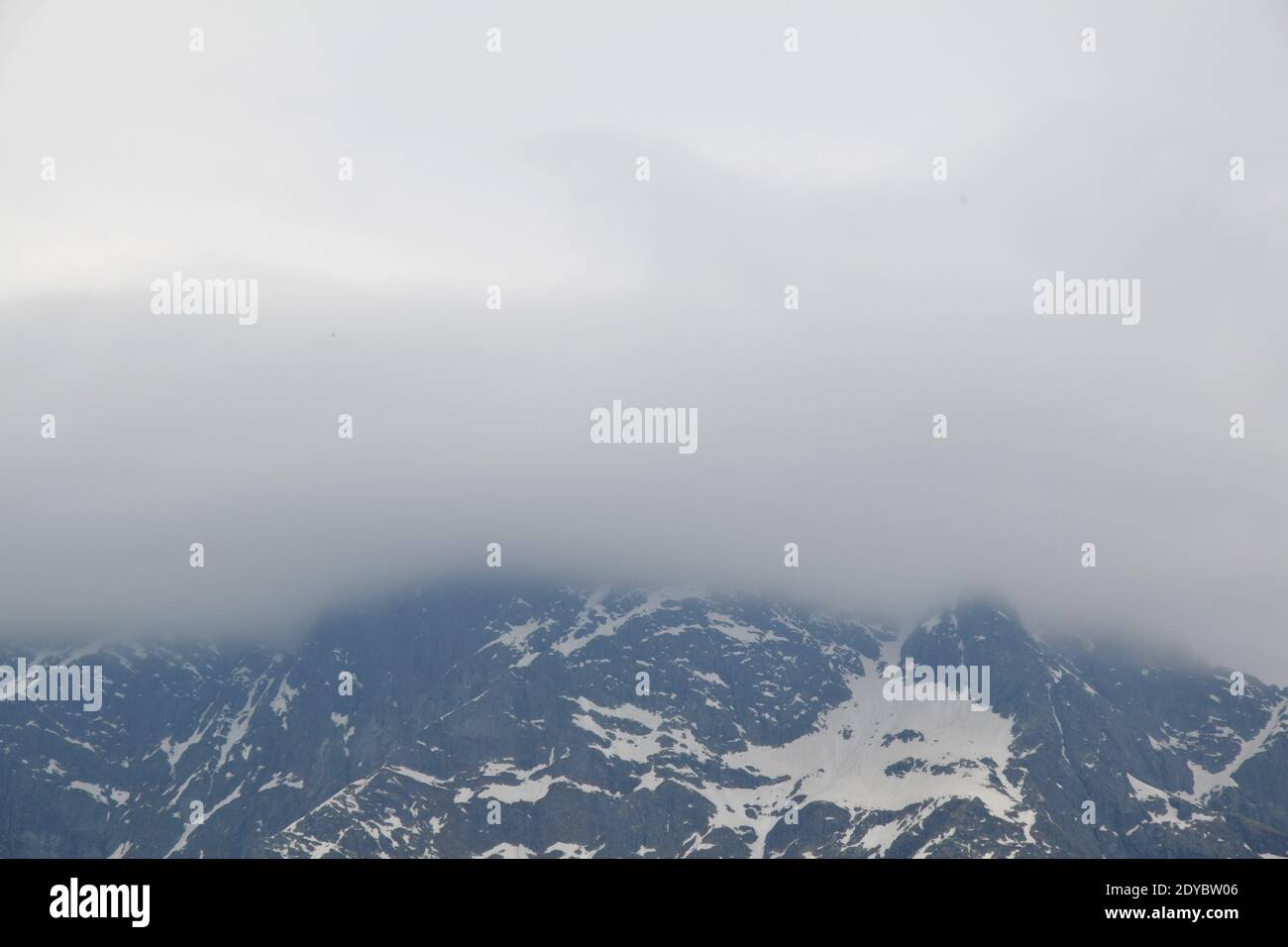 Mountains with snow in thick fog and clouds in Zakopane, Poland Stock ...