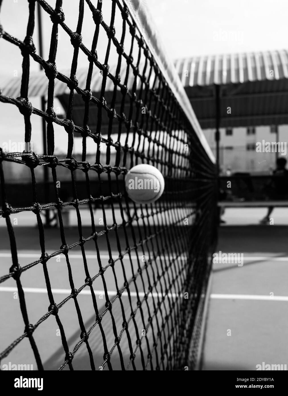 Hitting a ball Black and White Stock Photos & Images - Alamy