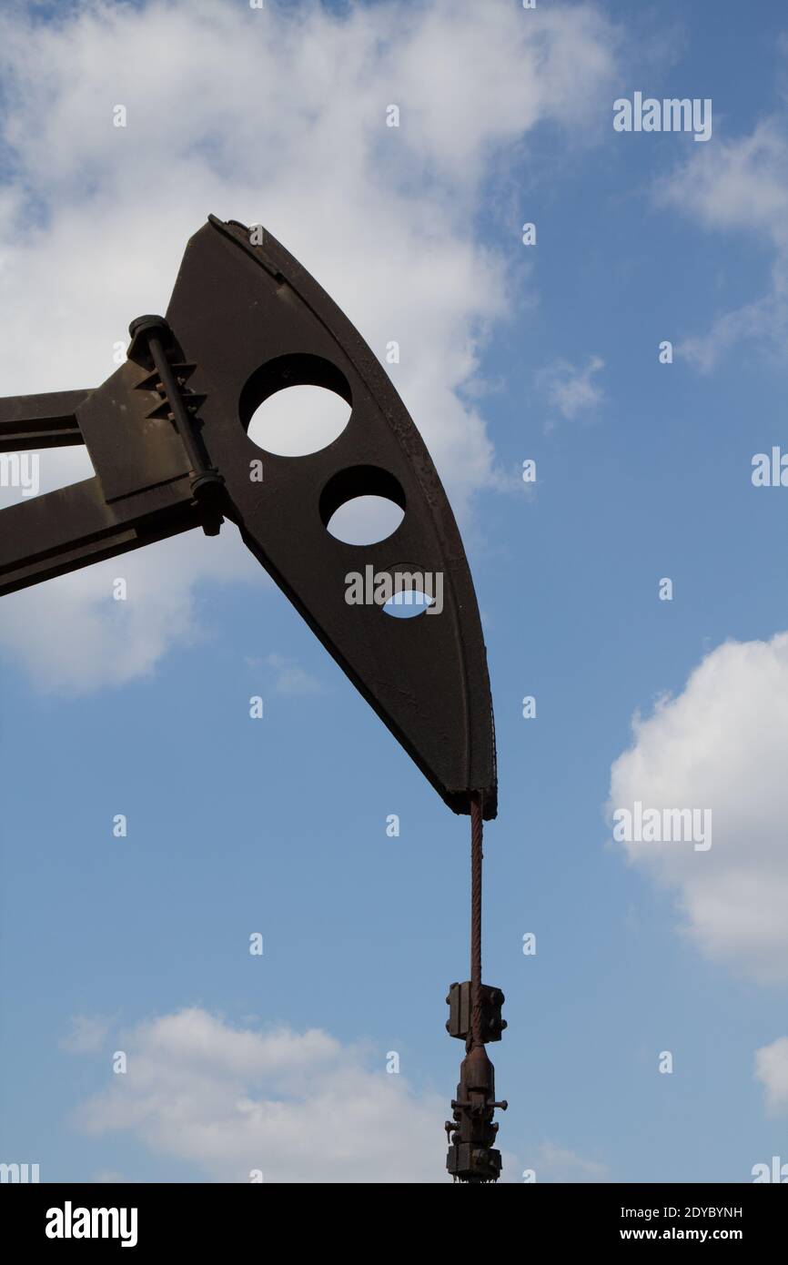 Working oil pump with blue sky Stock Photo - Alamy