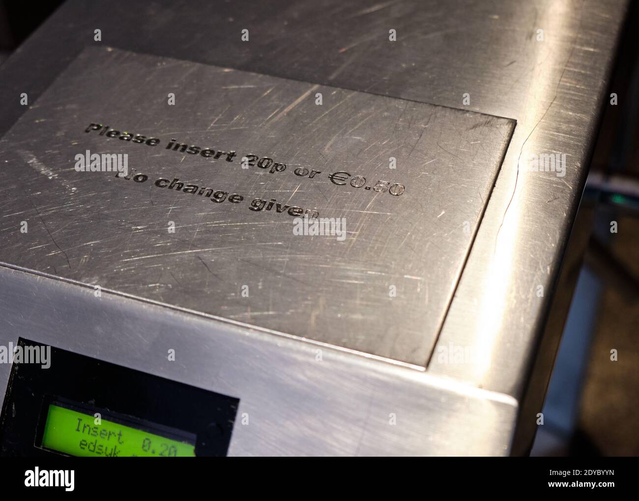 Sign please insert 20p or 0.50 euro on turnstile access to loo ...