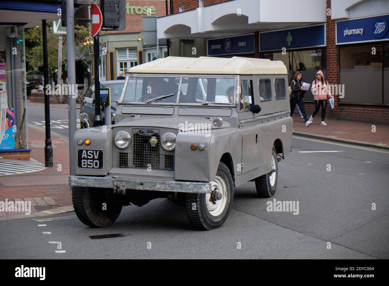 Grey 1961 Land Rover diesel turning a street corner in centre of Lewes ...