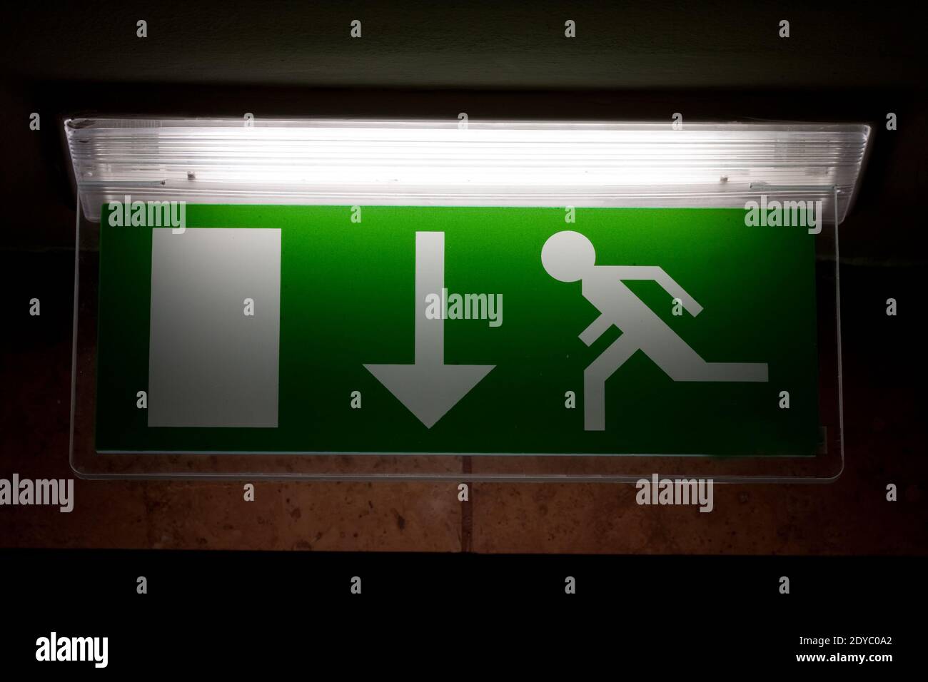Emergency exit sign in a building Stock Photo - Alamy