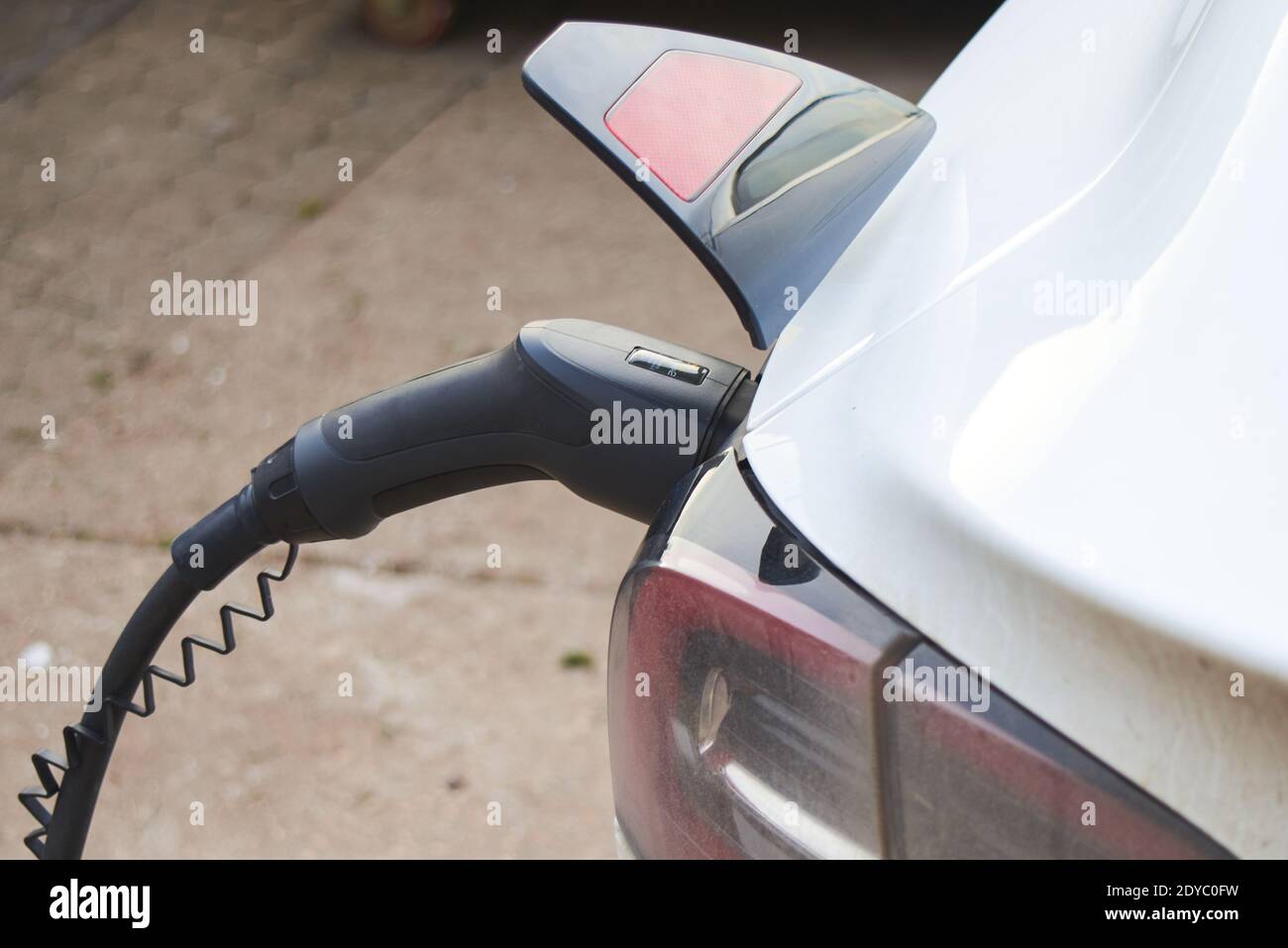 Charging an electric car battery Stock Photo - Alamy Charging an electric car battery Stock Photo - Alamy