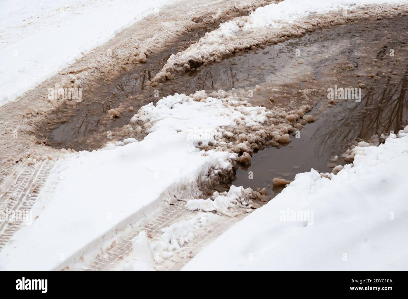 Deep puddle on a dirty road hi-res stock photography and images - Alamy