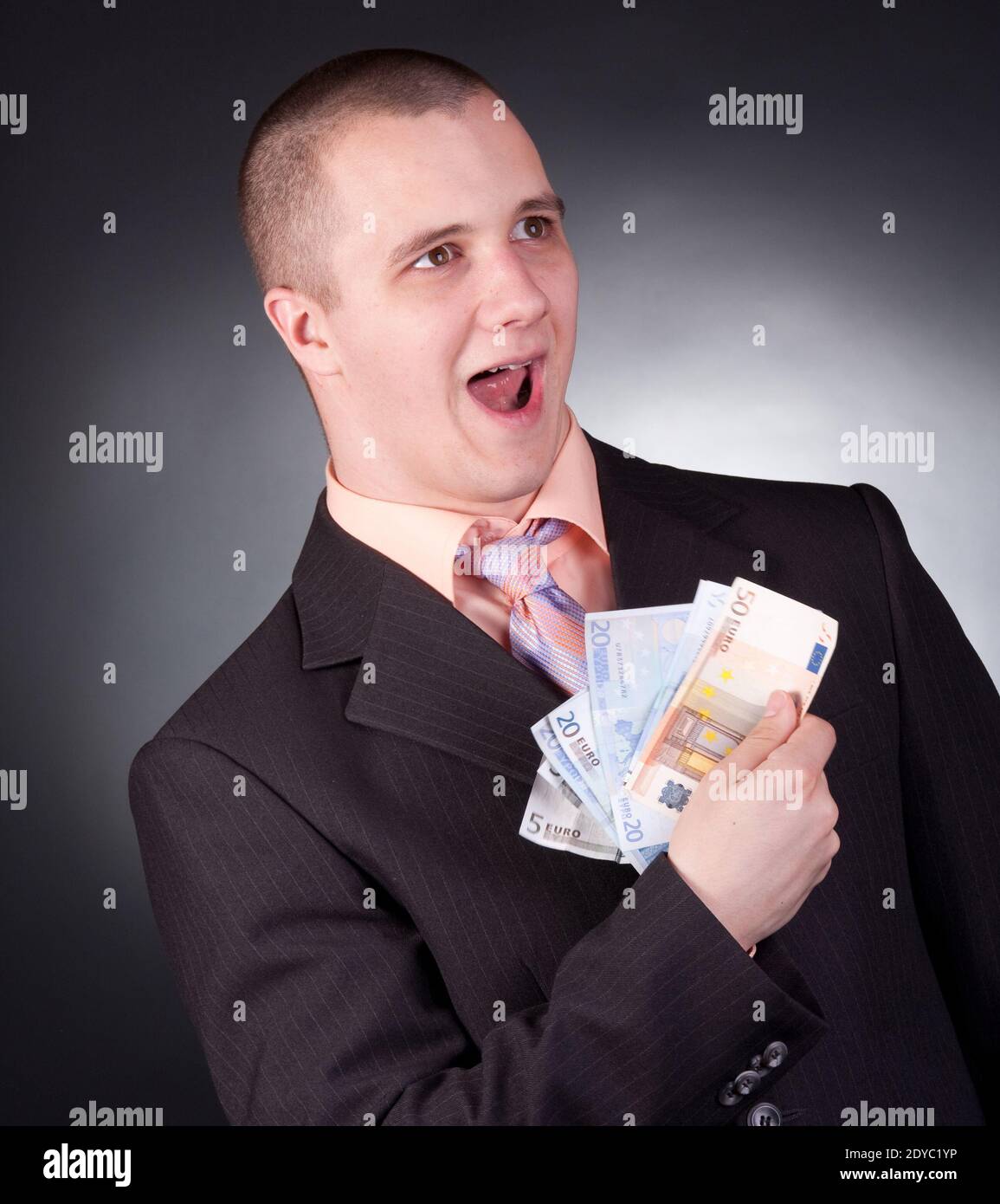 young handsome businessman with money Stock Photo - Alamy