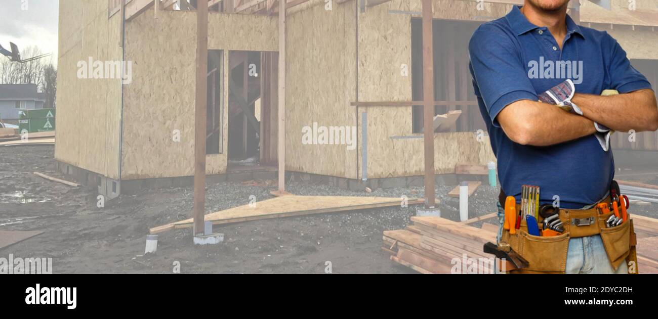 Construction Worker in front of construction site. A carpenter while ...