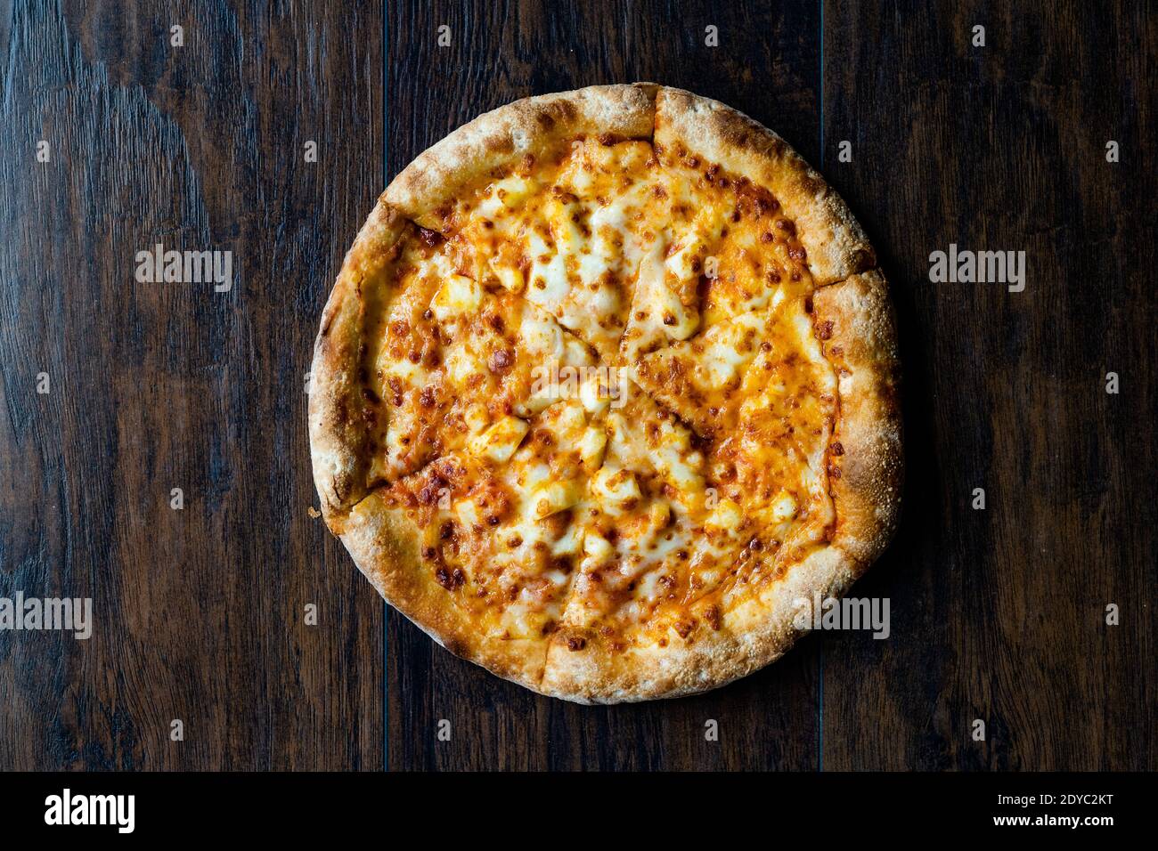 Pizza Quattro Formaggi Four Cheese Pizza on Wooden Surface. Ready to Eat Stock Photo - Alamy