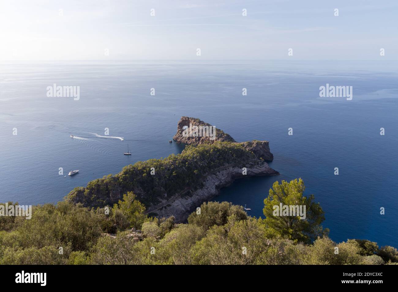 An aerial shot of an endless sea and beautiful cliffs covered with ...