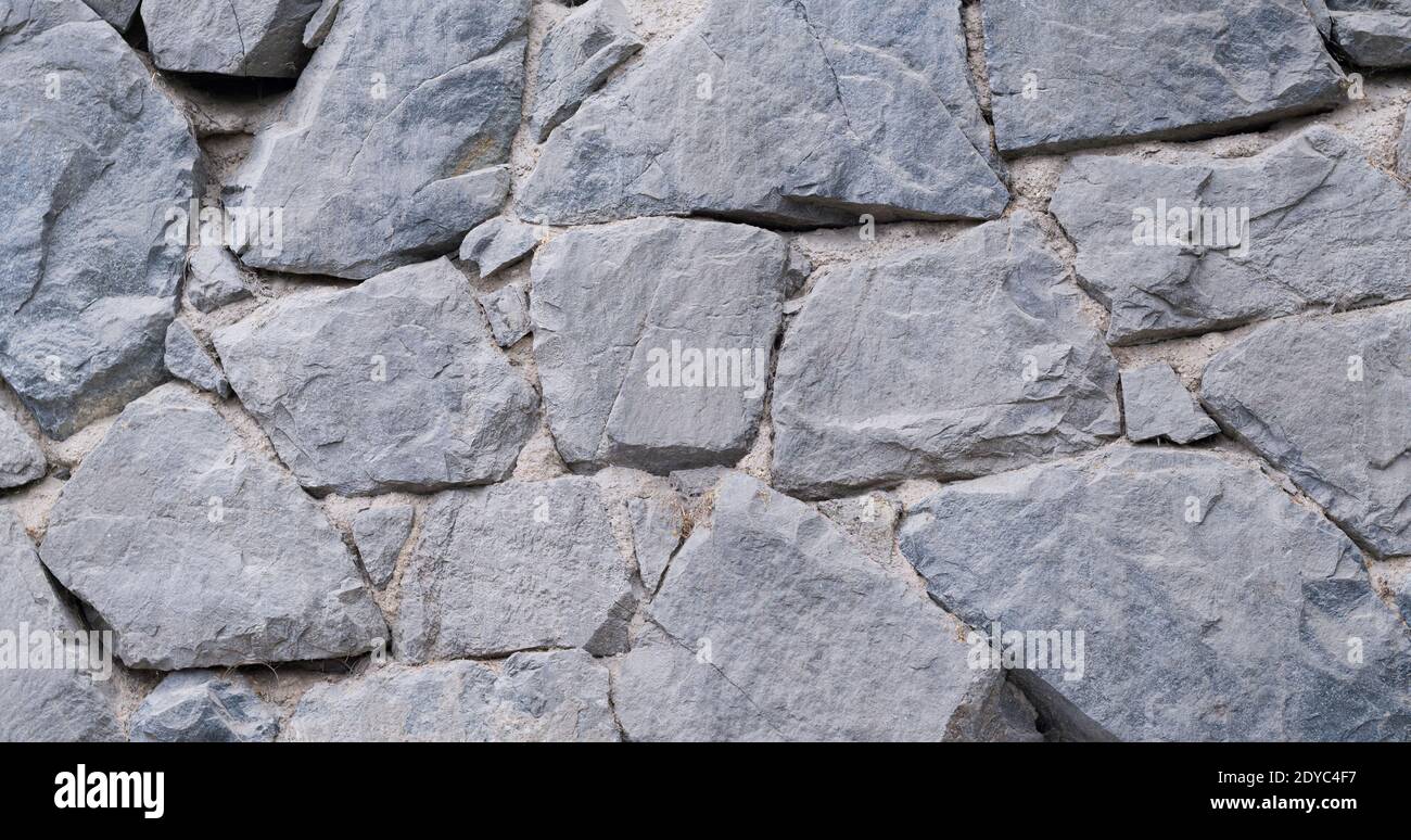 Stone and mortar wall for background - closeup Stock Photo - Alamy