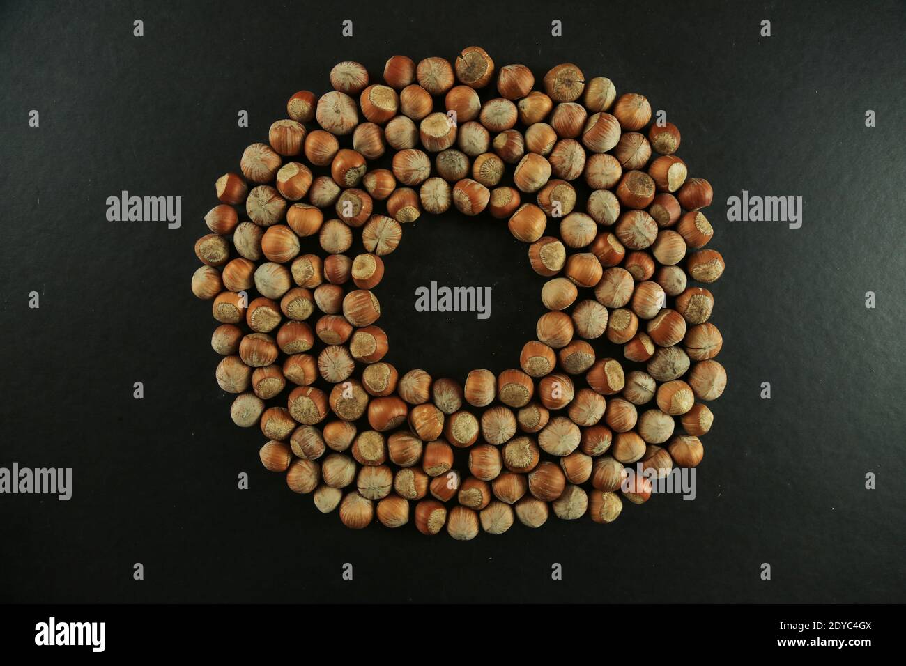Hazelnuts on wooden backdrop. Hazelnut background. High quality photo ...