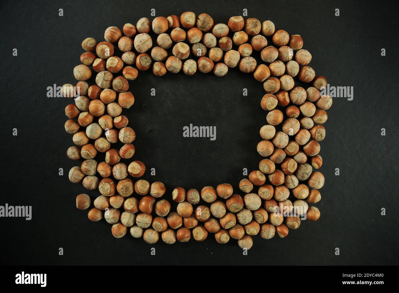 Hazelnuts on wooden backdrop. Hazelnut background. High quality photo ...