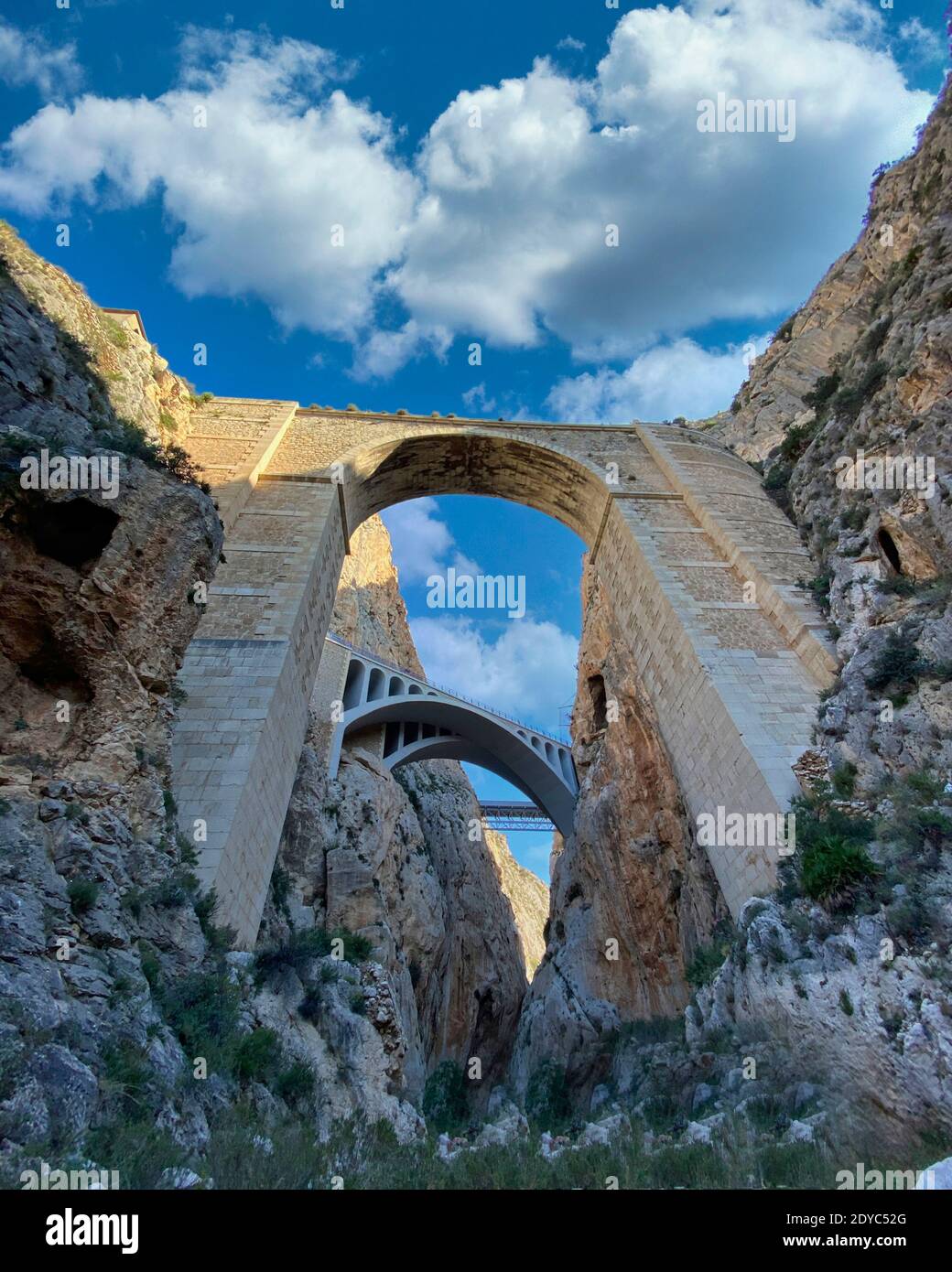 ancient roman bridge joining a canyon in spain Stock Photo - Alamy
