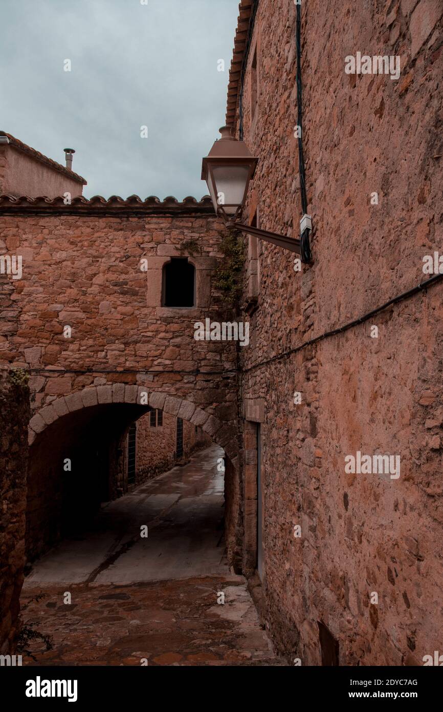 A vertical shot of buildings and street of an old town Stock Photo - Alamy