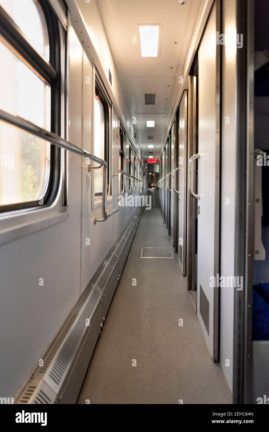 Corridor in the sleeping car of train. Rail travel. Vertical frame ...