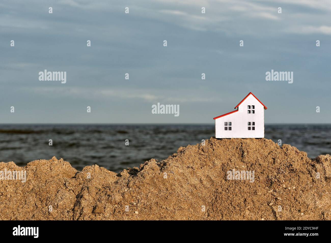 Small house on sea background. Building house on beach. Sale sea coast ...