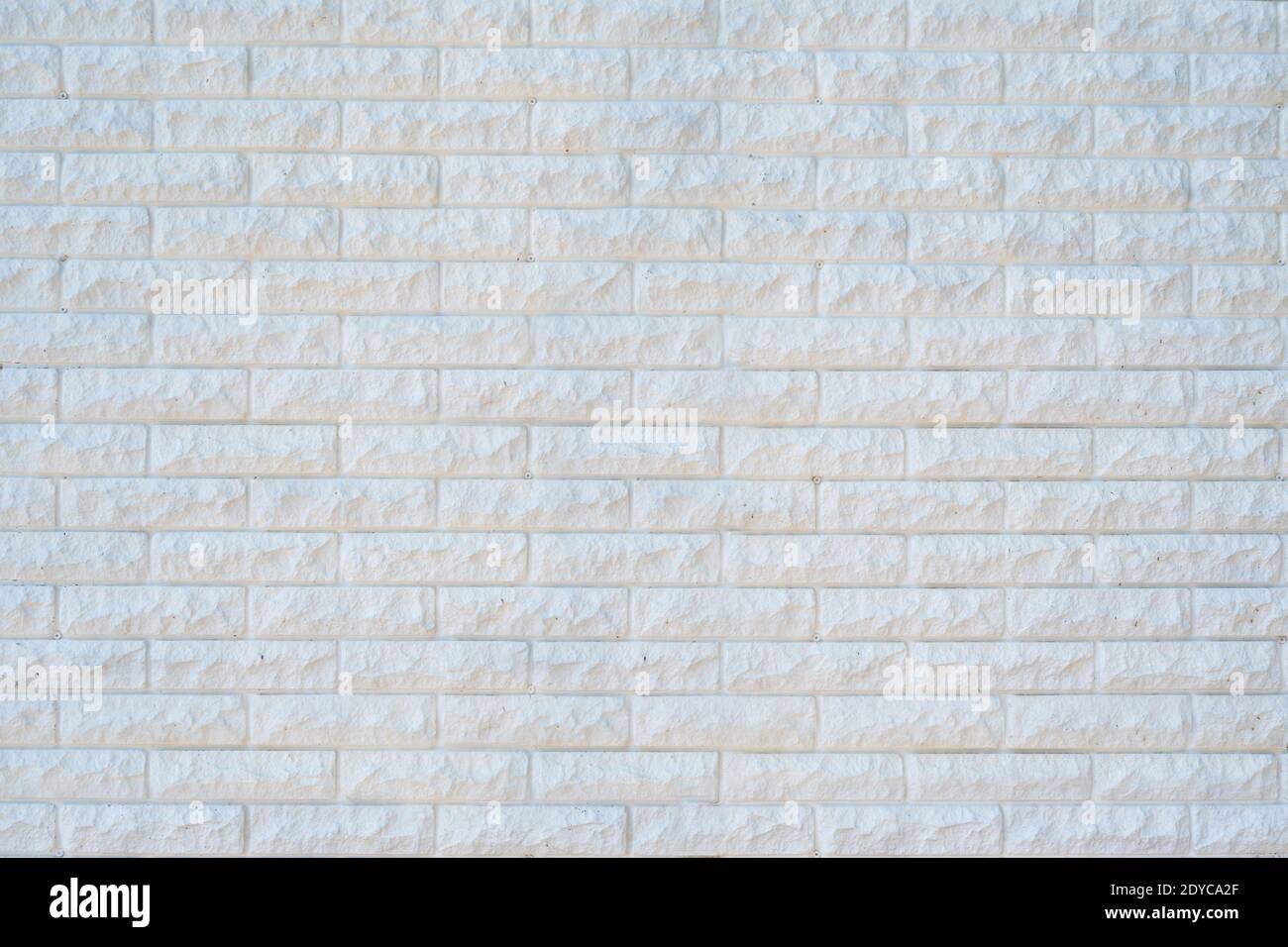 White brick surface. Abstract construction background Stock Photo - Alamy