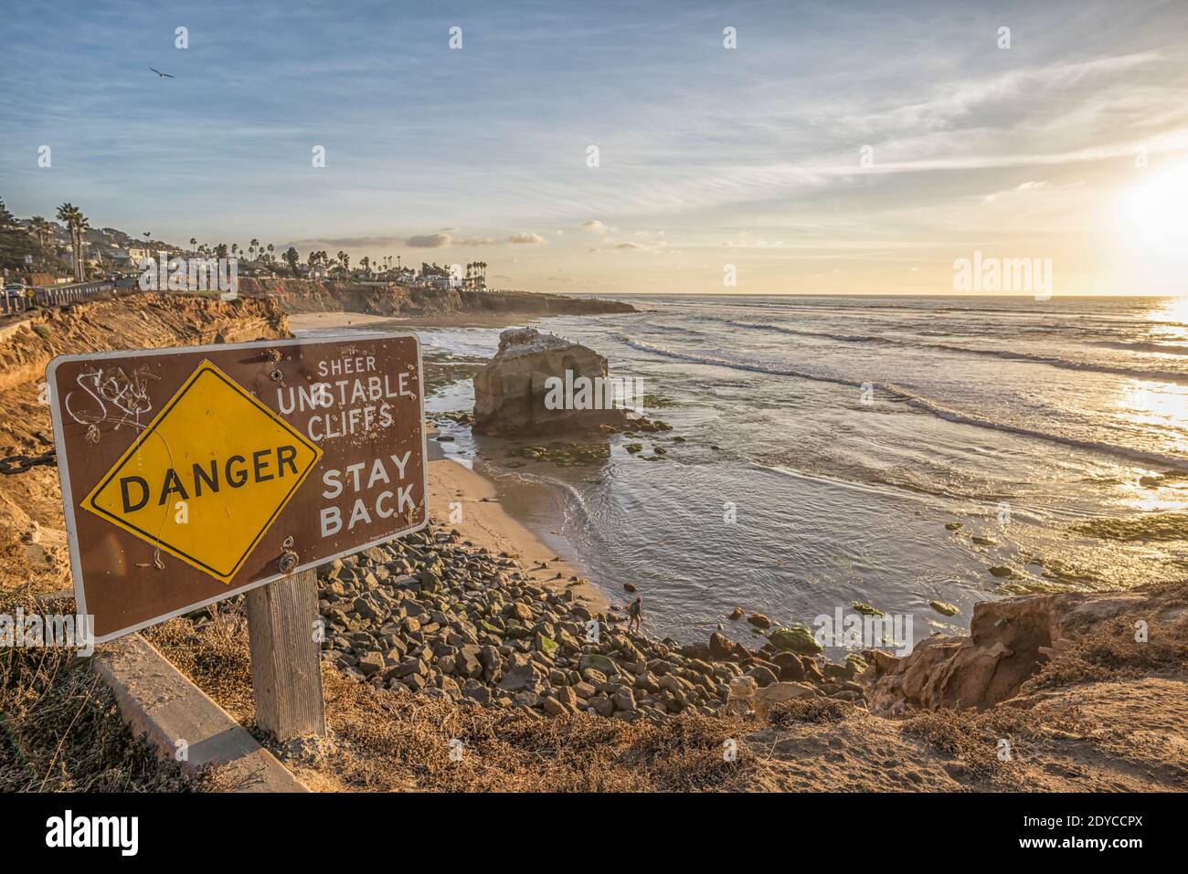 Warning sign danger rocks waves hi-res stock photography and images - Alamy