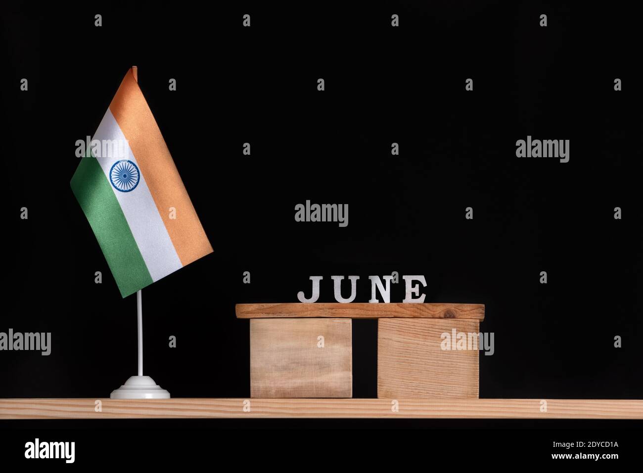 Wooden calendar of June with Indian flag on black background. Holidays ...
