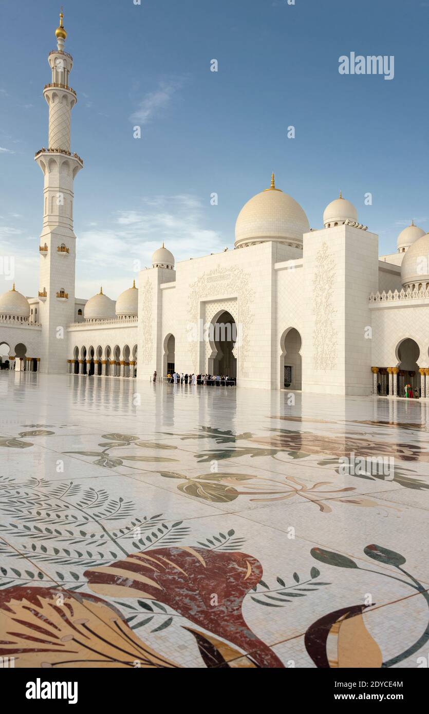Sheikh Zayed Grand Mosque courtyard with marble inlay, arches and ...