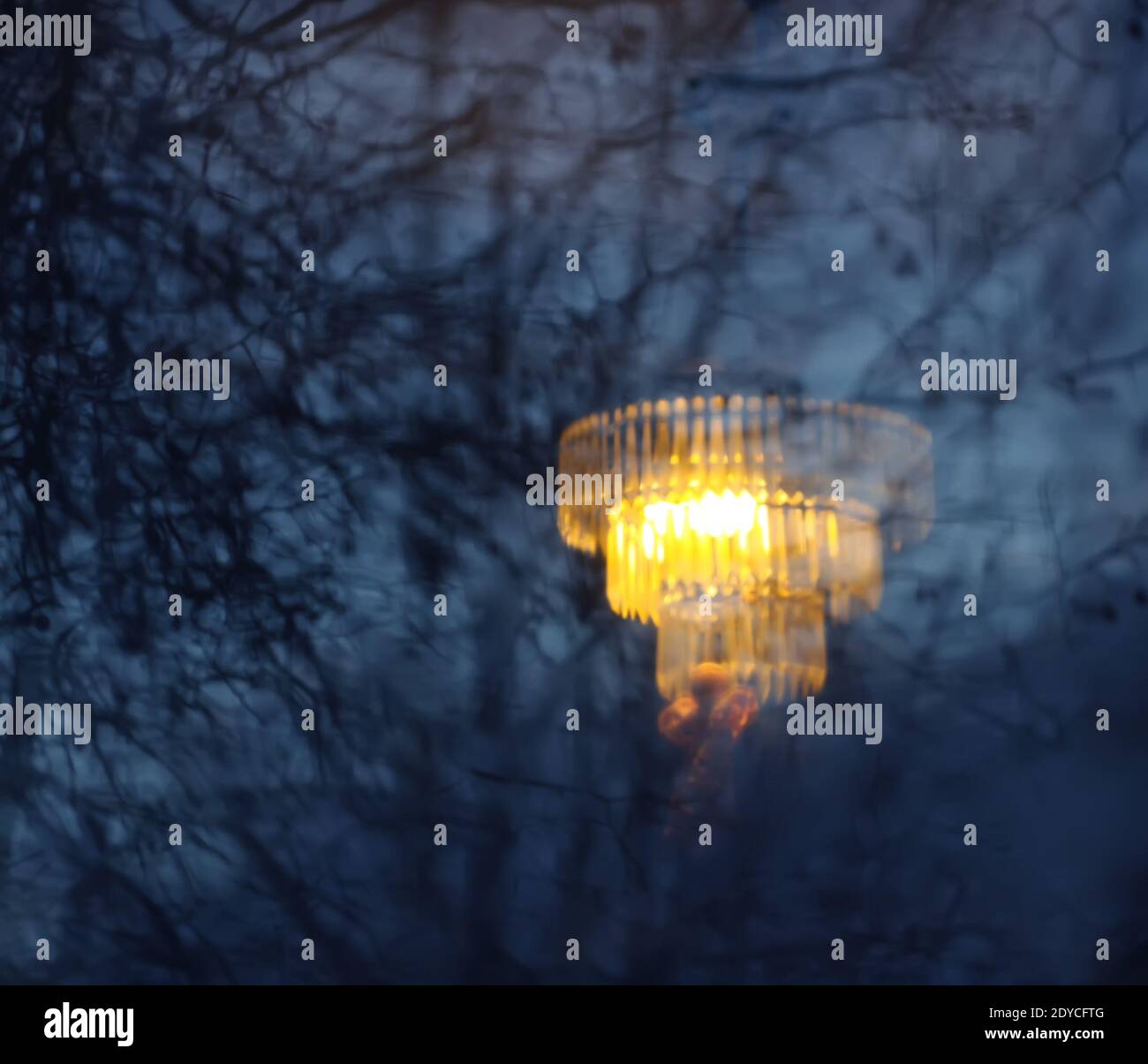 Old chandelier and tree reflection in the window glass Stock Photo - Alamy