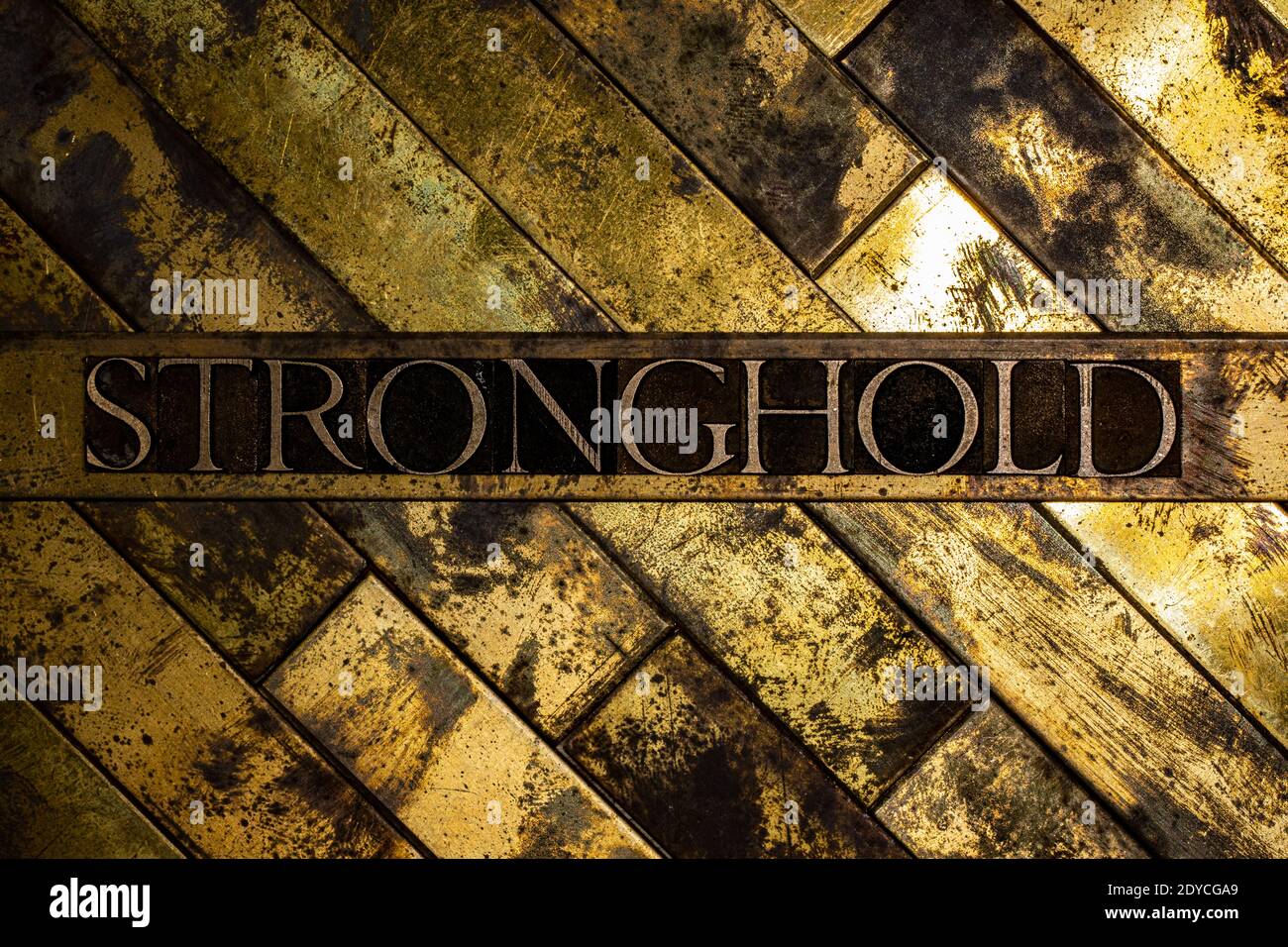 Stronghold text message on textured grunge copper and vintage gold ...