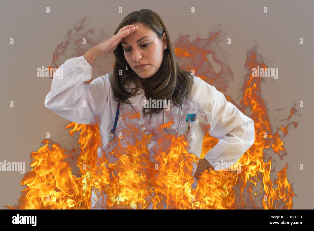 Burning female doctor explains the concept of burn out syndrome in ...