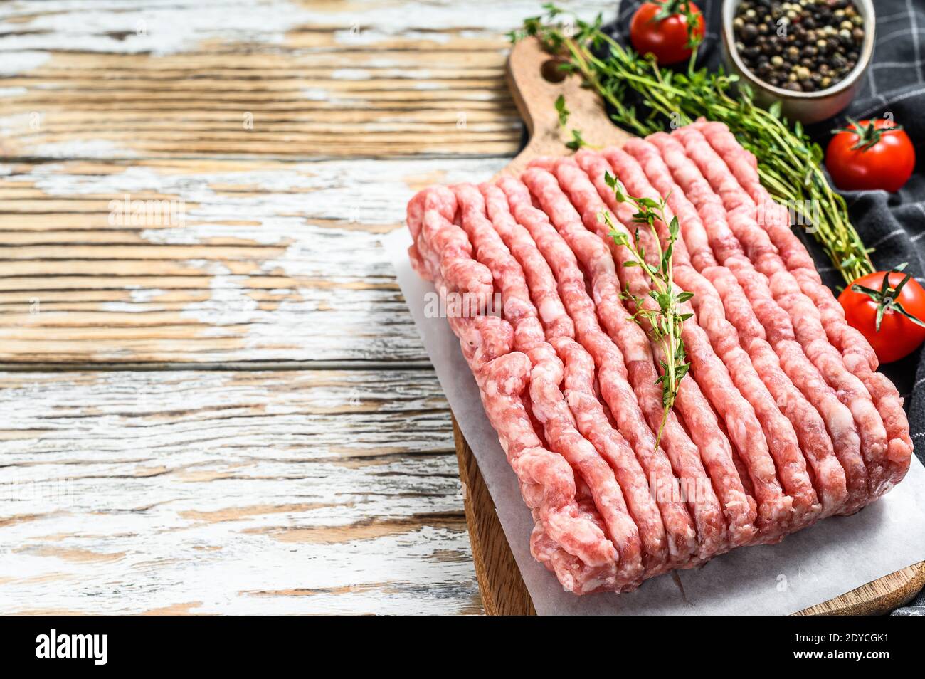 Raw chicken, Turkey ground meat on a chopping Board. Organic forcemeat ...