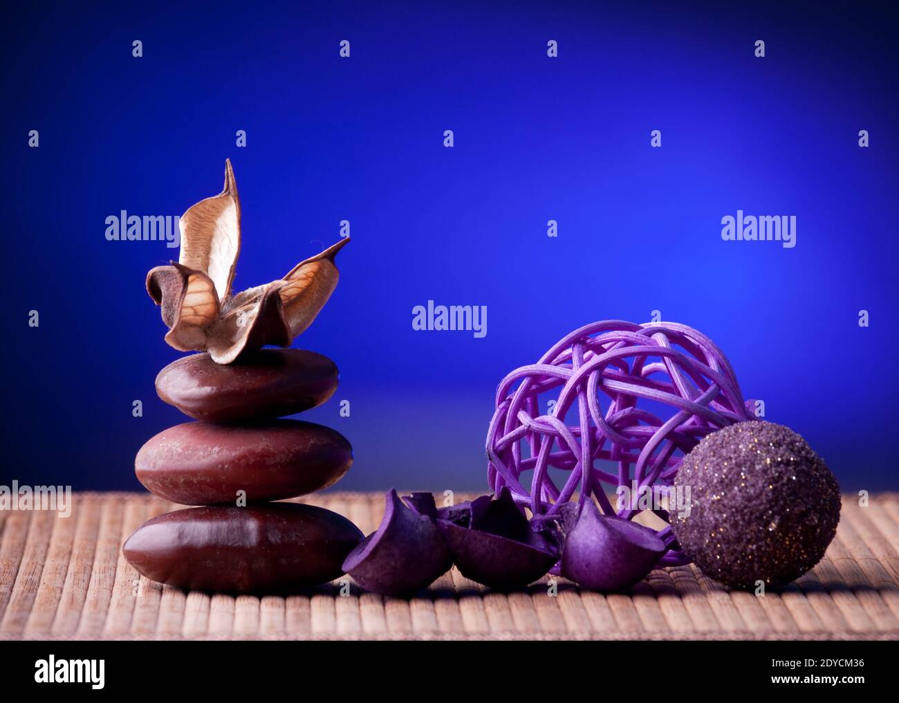 Purple Potpourri arranged zen style Stock Photo - Alamy