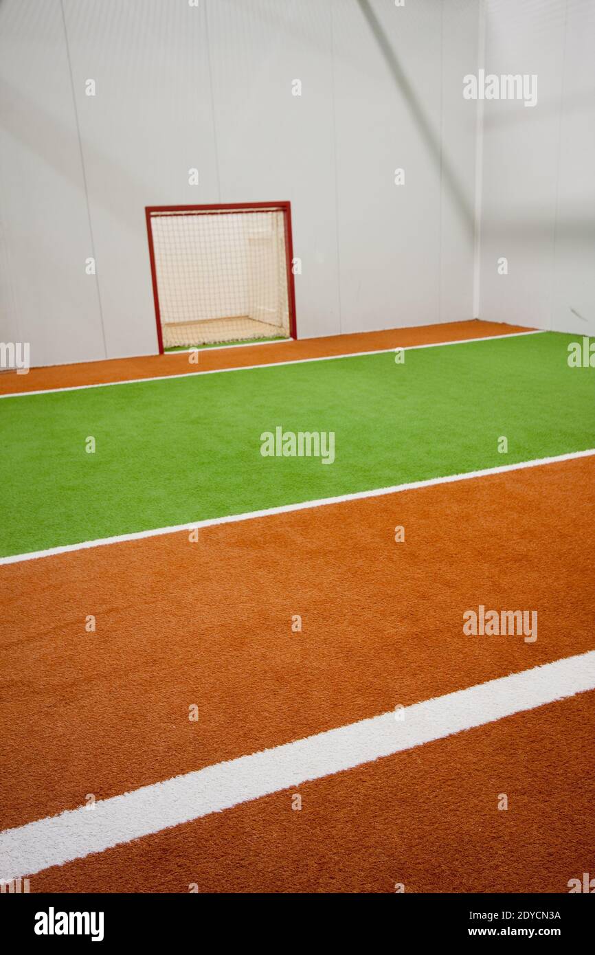 Jorky ball field with gate Stock Photo - Alamy