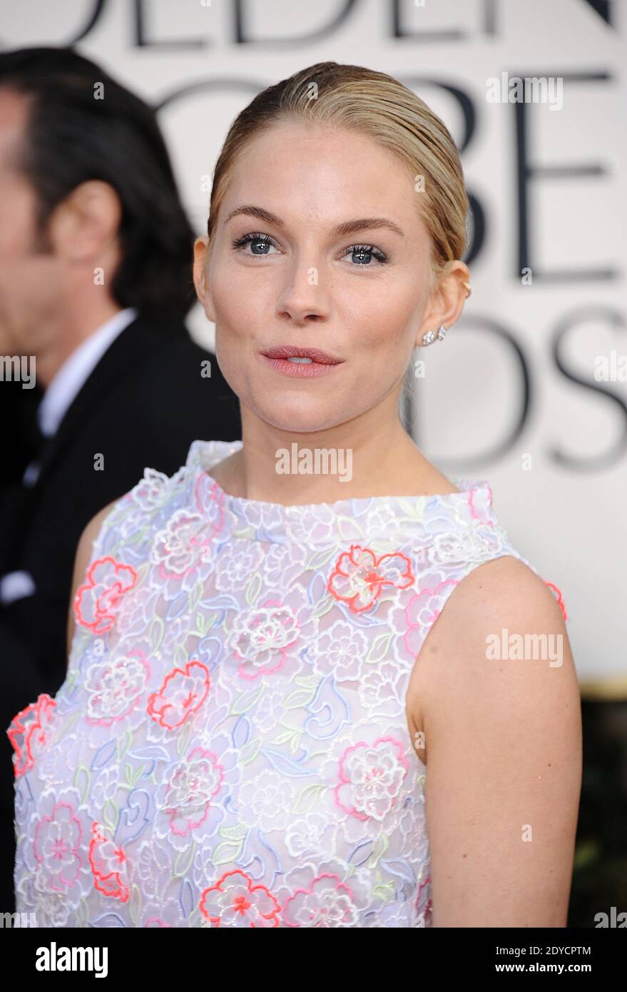 Sienna Miller arriving for the 70th Annual Golden Globe Awards Ceremony ...