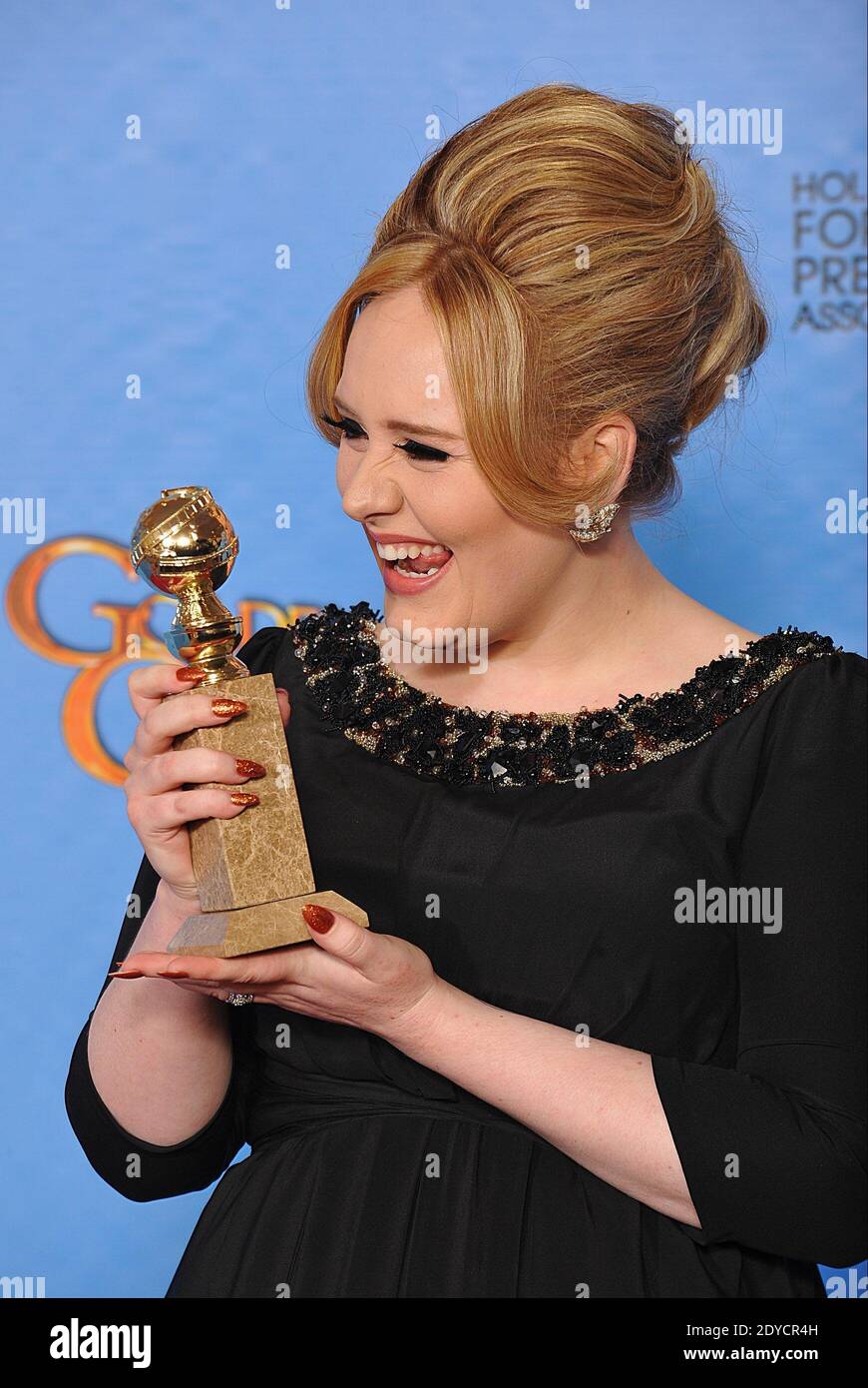 Adele with the award for best song for the theme tune to the last James ...