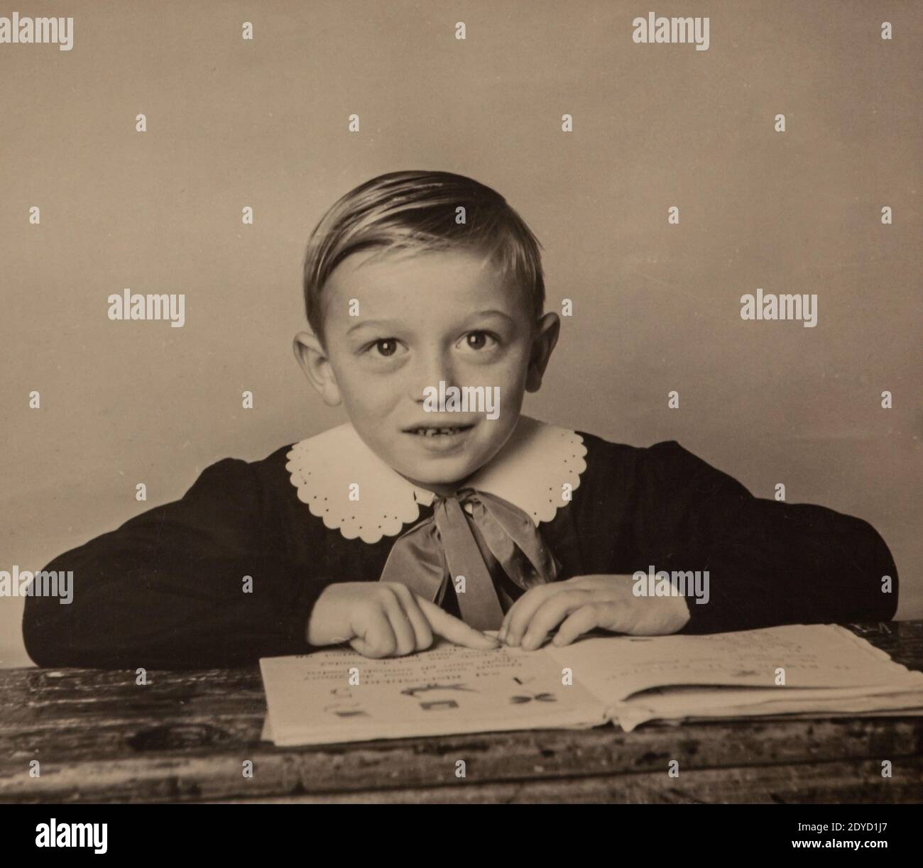 Vintage child children learning to read reading hi-res stock ...